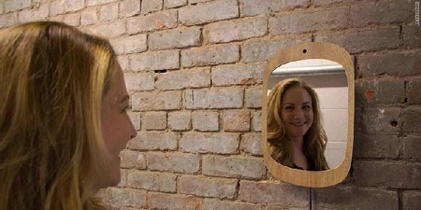 Smile Mirror: o espelho que só funciona à quem sorri - greenMe
